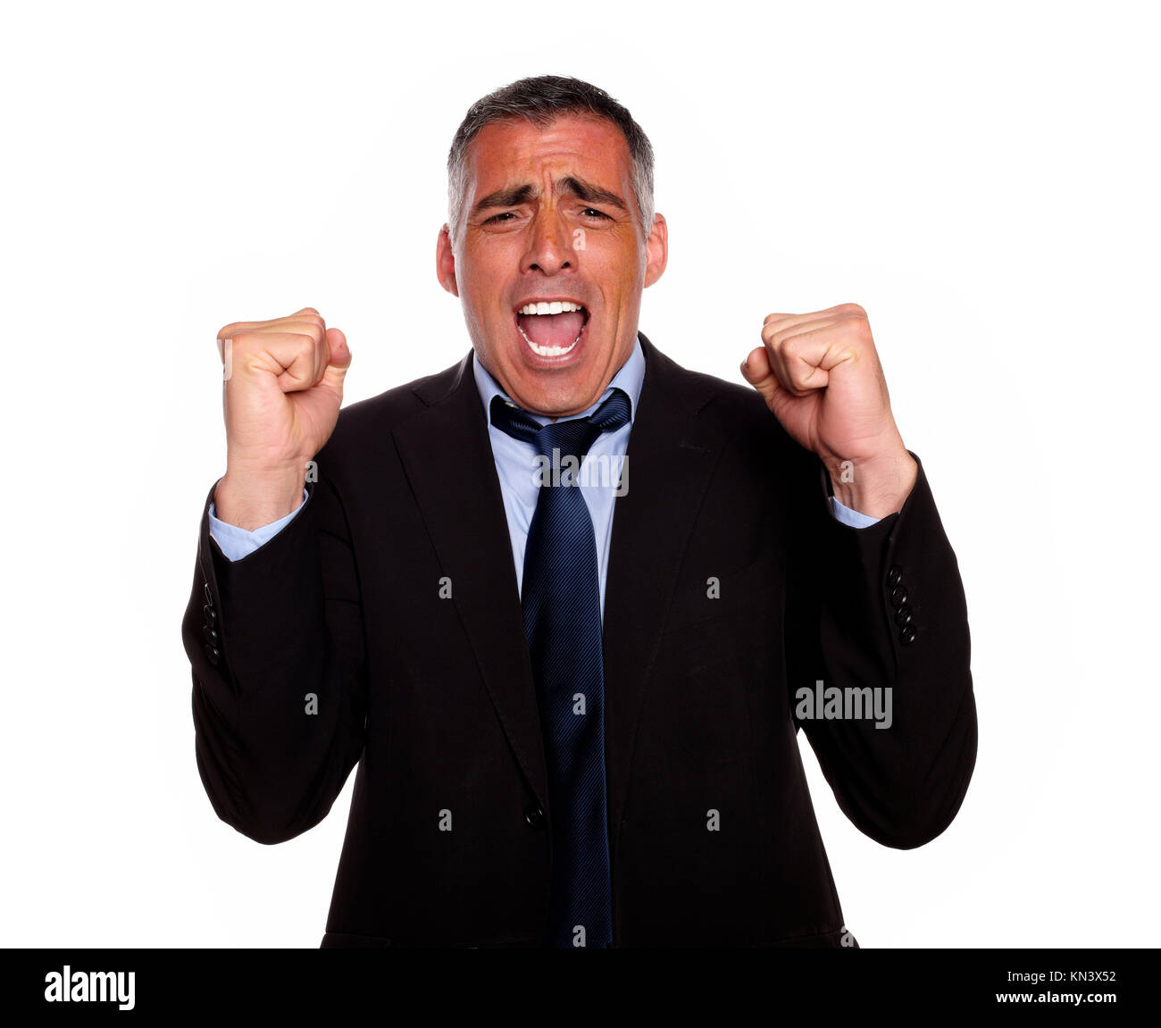 Portrait of a excited and happy broker screaming and celebrating a ...