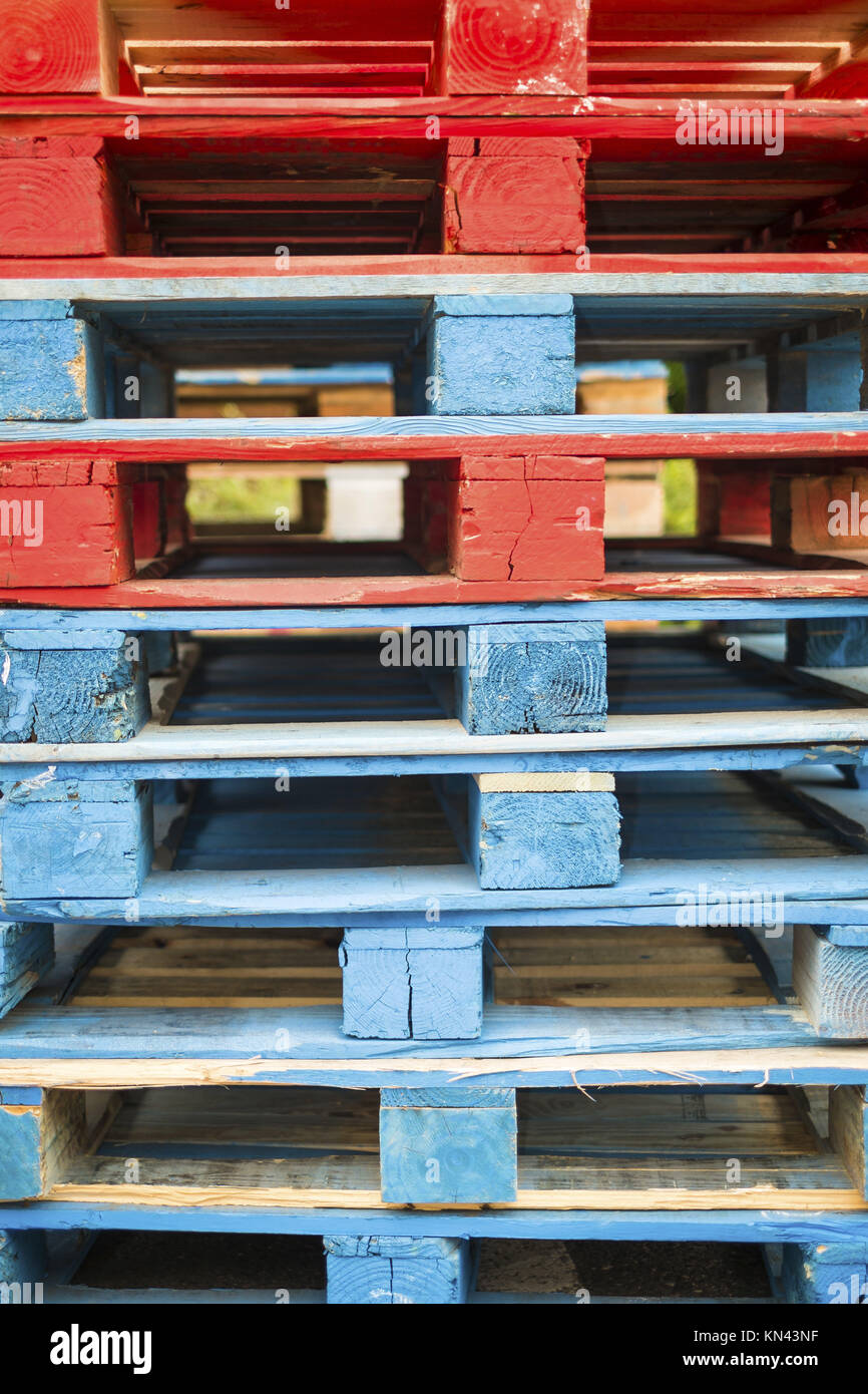 Stack of blue wooden pallets hi-res stock photography and images - Alamy