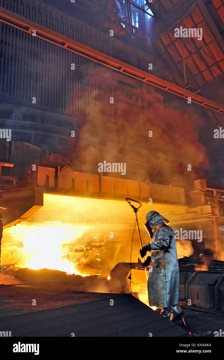 steel worker and hot steel Stock Photo - Alamy