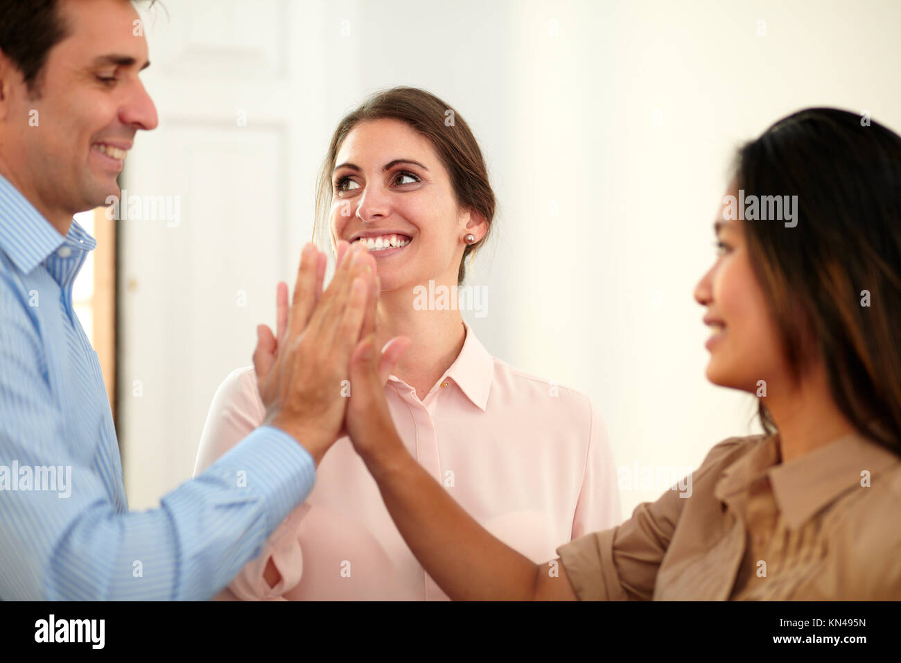 Team huddle hi-res stock photography and images - Alamy
