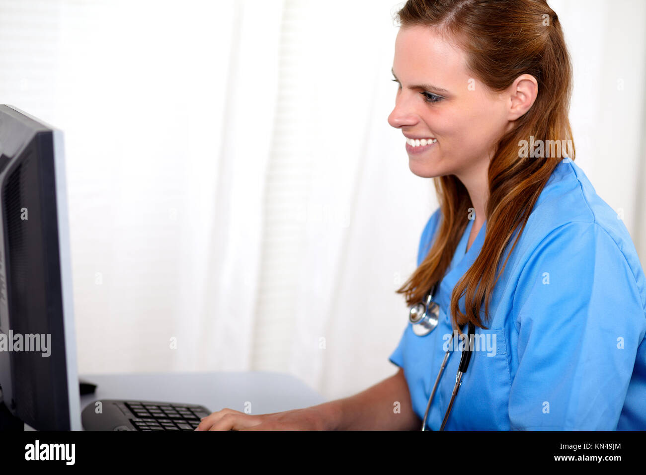 Nurse computer monitor screen looking hi-res stock photography and ...