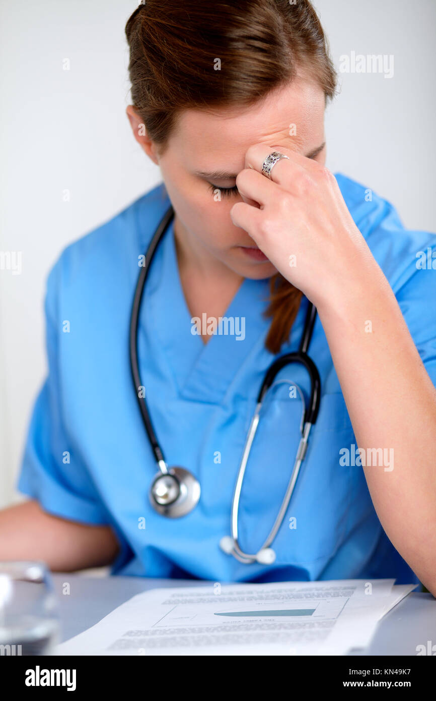 Tired doctor hi-res stock photography and images - Alamy