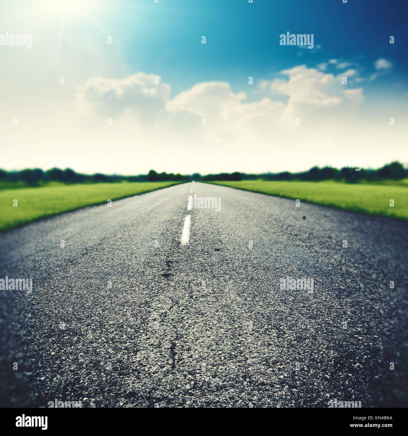 Asphalt road under wide blue skies, abstract travel backgrounds Stock ...