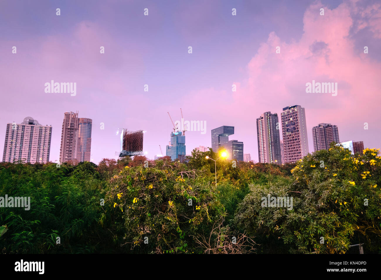 The urban view of Bangkok seen from Makkasan Airport Rail link station ...