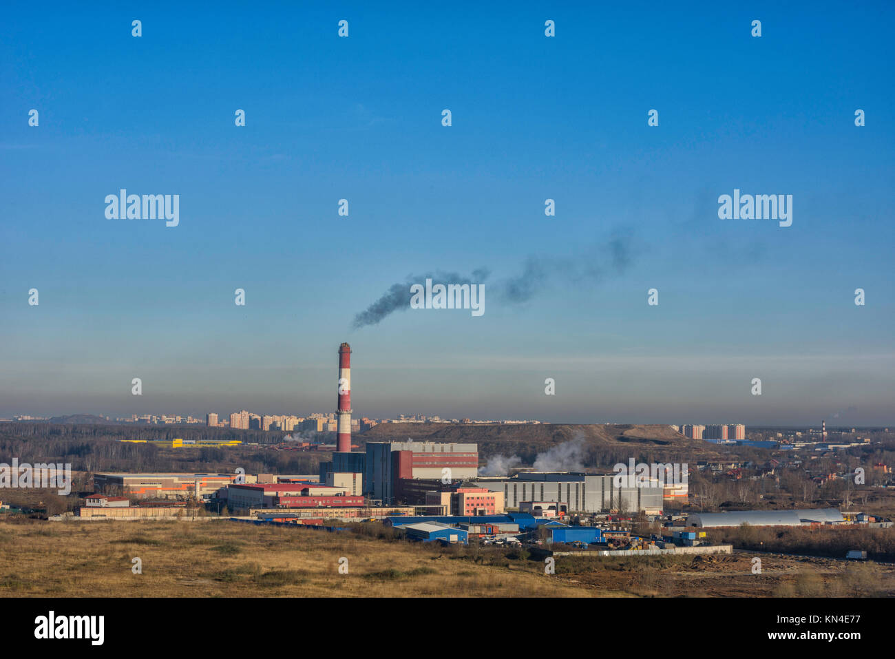 pollution of the atmosphere with harmful emissions from the factory ...