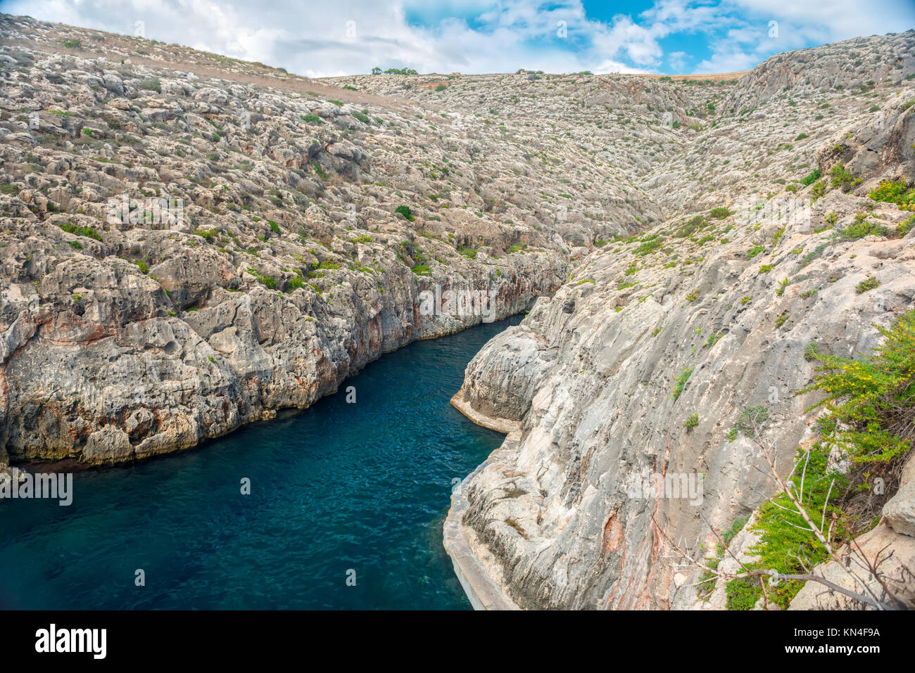 beautiful european view of cliff in blue lagoon with turquoise water ...
