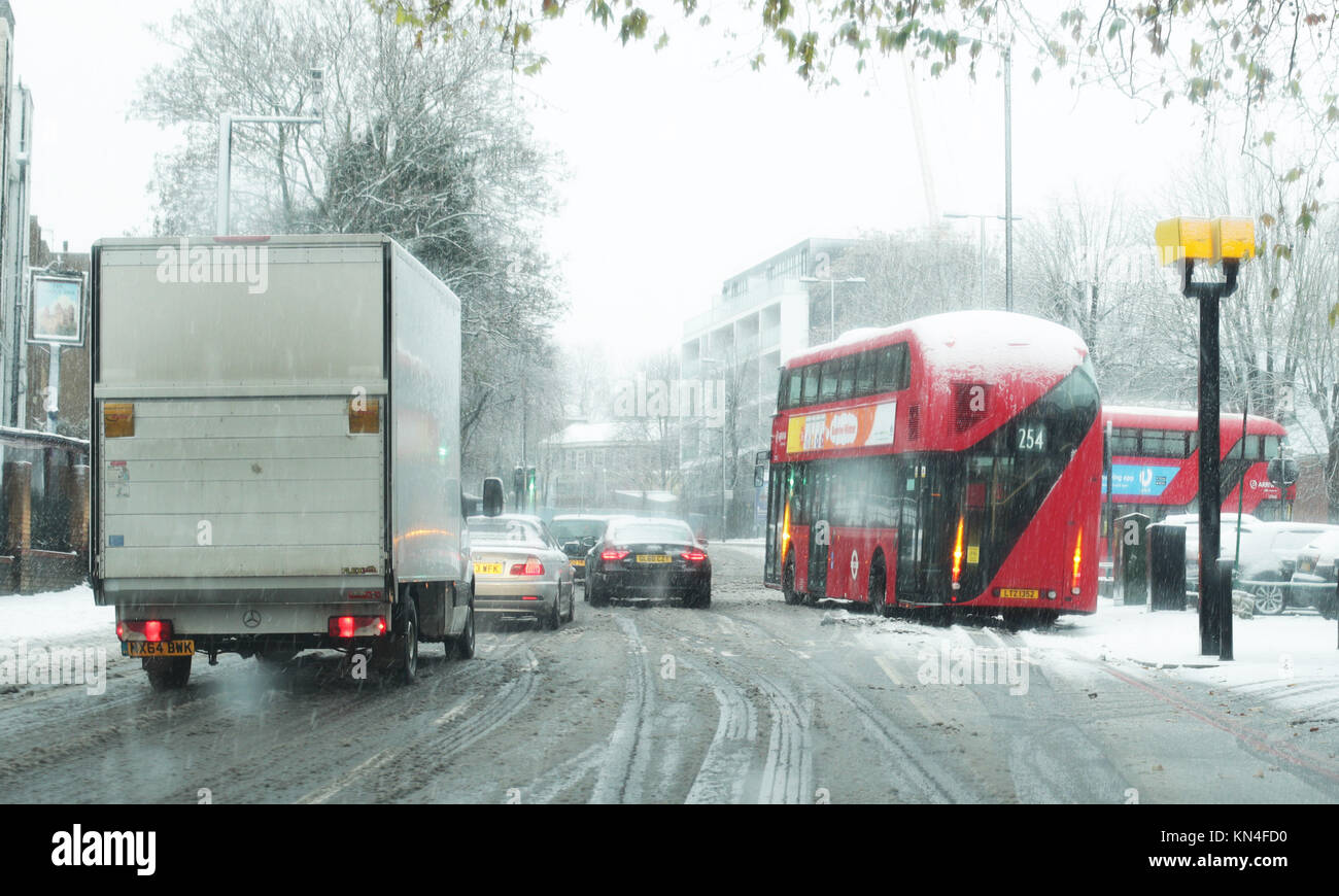 A stranded bus in Camden, as heavy snowfall across parts of the UK is ...