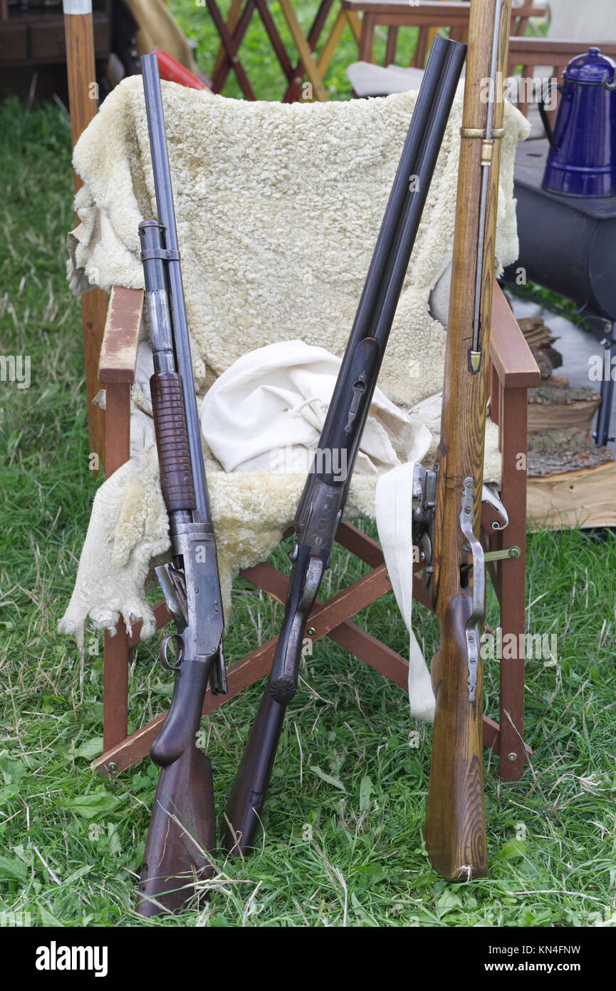 Three flintlock riffles at a wild west reenactment Stock Photo - Alamy