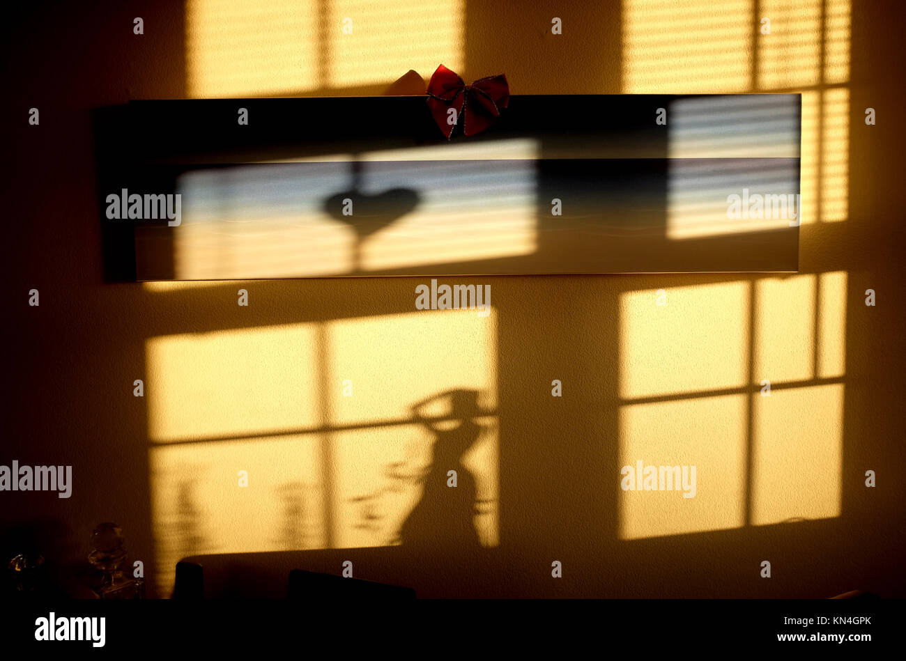 Spooky shadows and heart shape shadows on wall created by low Stock ...