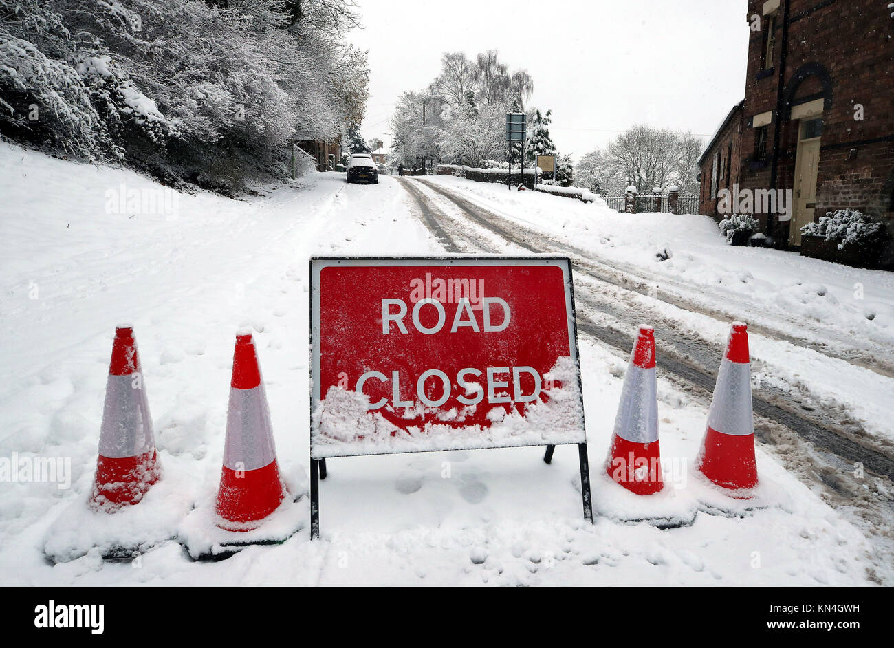 A road closed sign in snow covered Ironbridge in Shropshire, as heavy ...