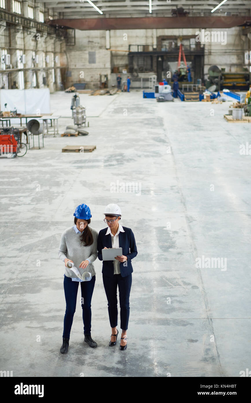Giving Tour of Modern Factory Stock Photo - Alamy