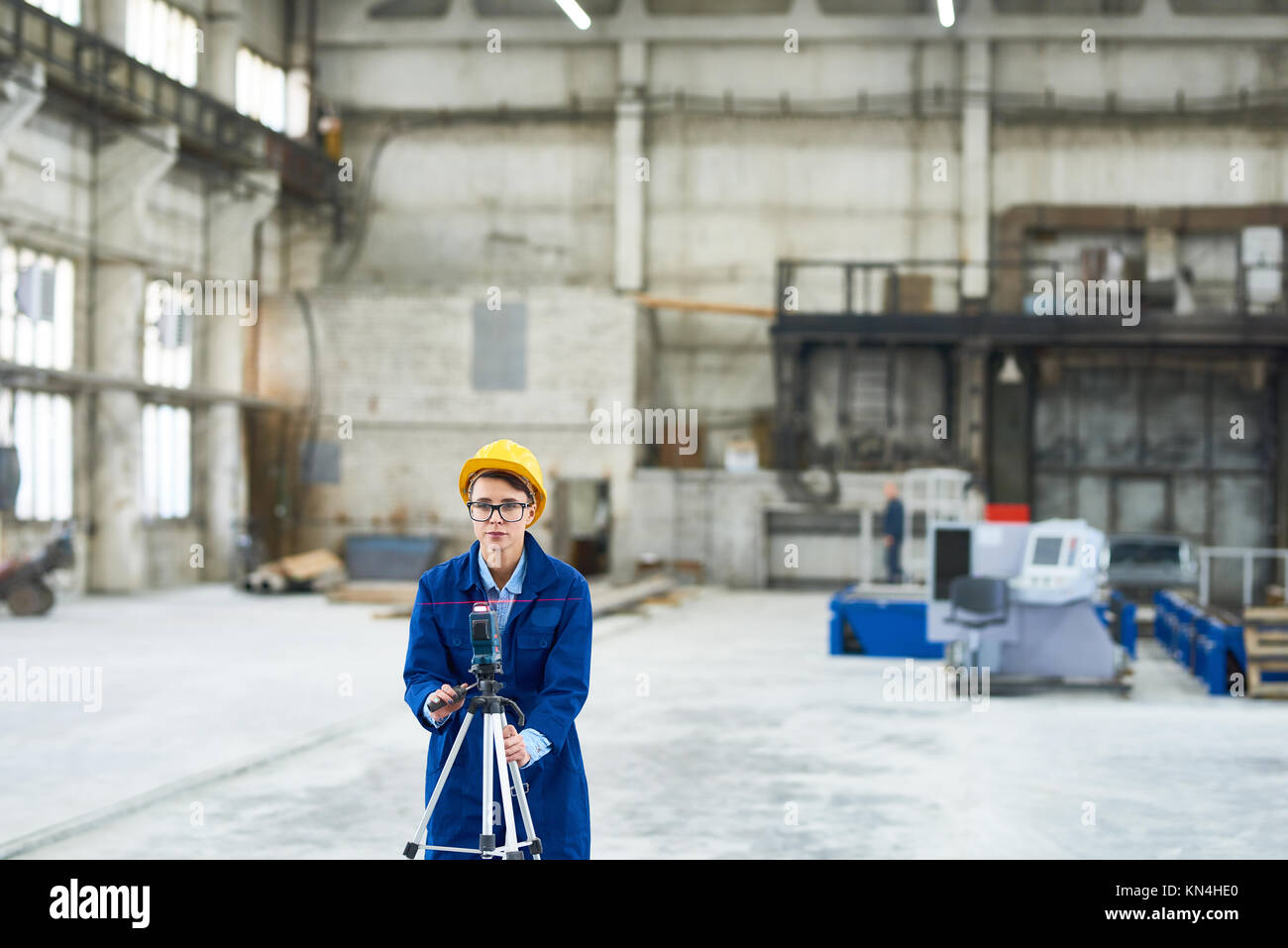 Worker Using Total Station Theodolite Stock Photo - Alamy