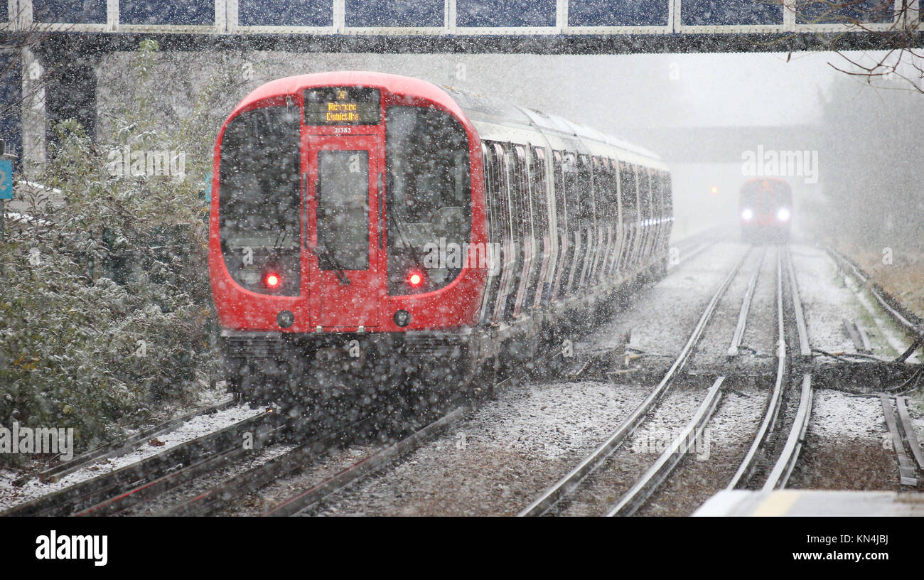 District Line trains pass near Kew Gardens station, in south west ...