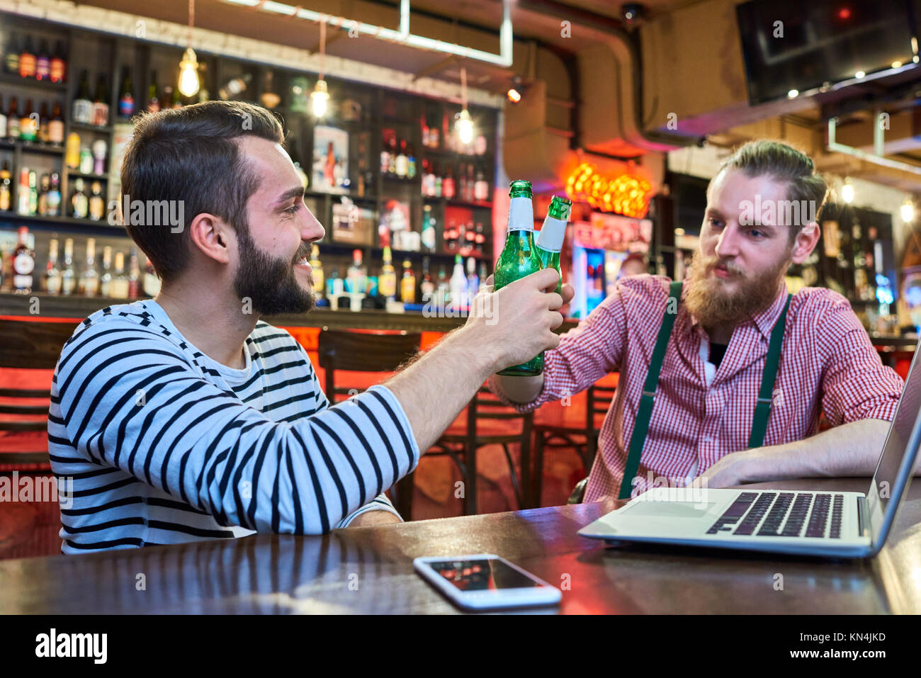 Buddies Chilling in Bar Stock Photo - Alamy