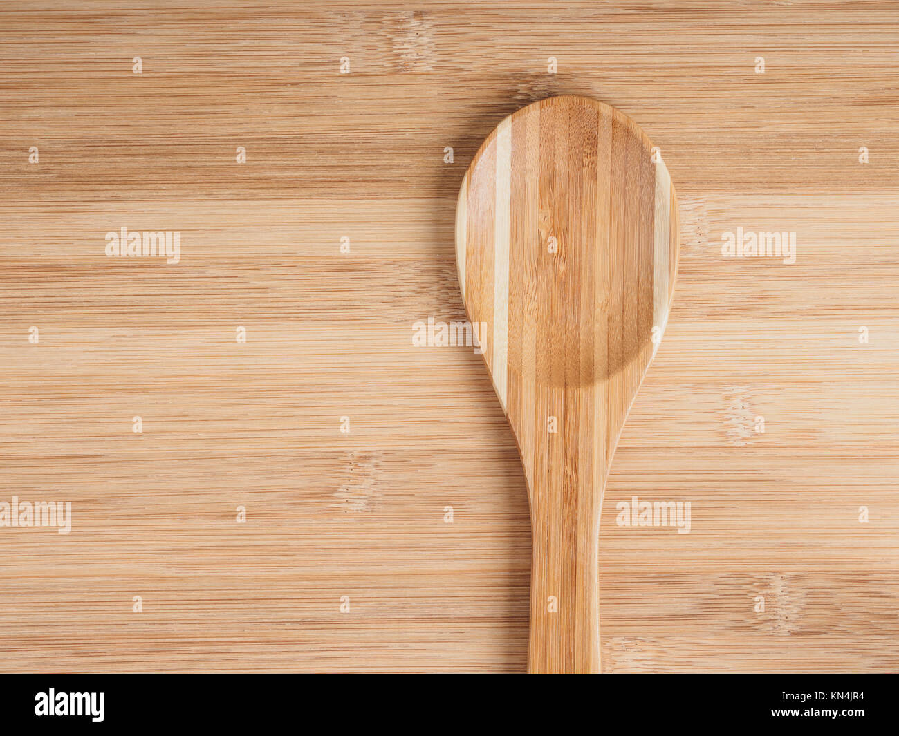 Wooden spoon placed on wood floor Stock Photo - Alamy