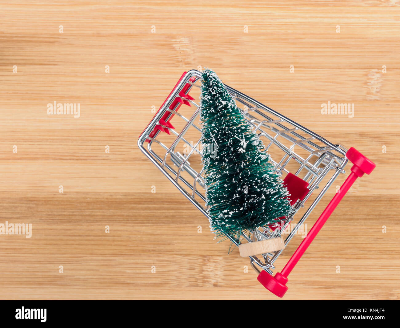 christmas tree in trolley Stock Photo - Alamy