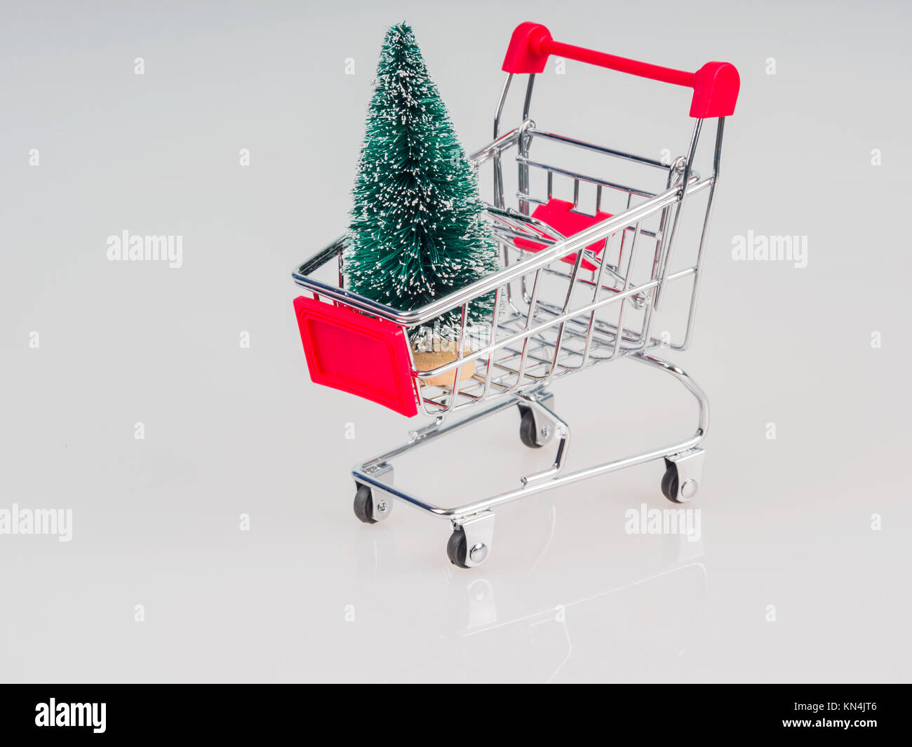 christmas tree in trolley Stock Photo - Alamy