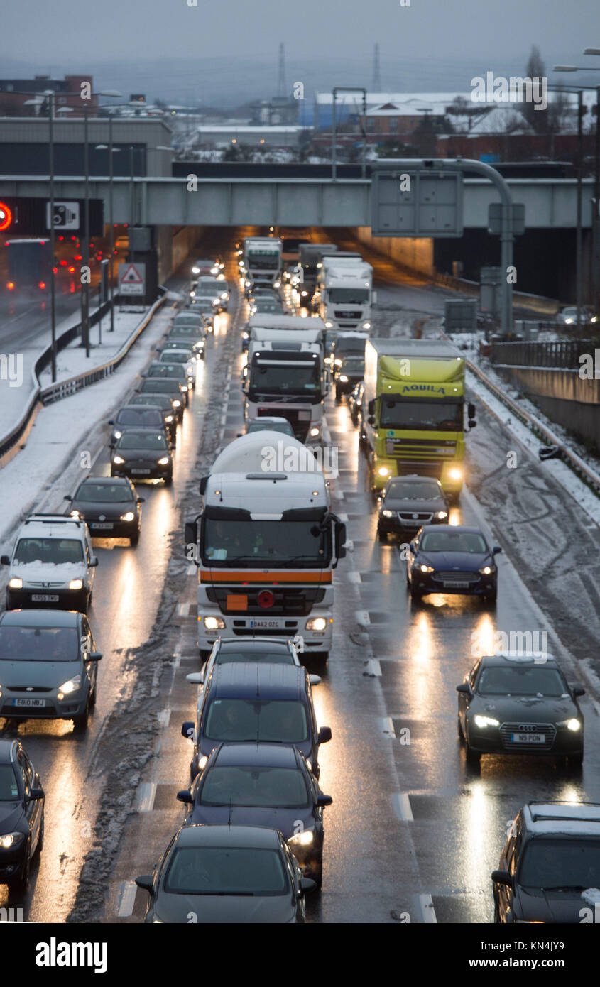 Heavy traffic on the M25 motorway near junction 25, as heavy snowfall ...