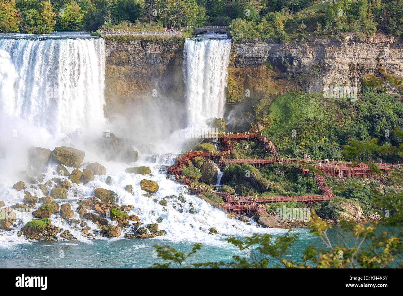 Tourists in front of waterfall, American Falls and Bridalveil Falls ...