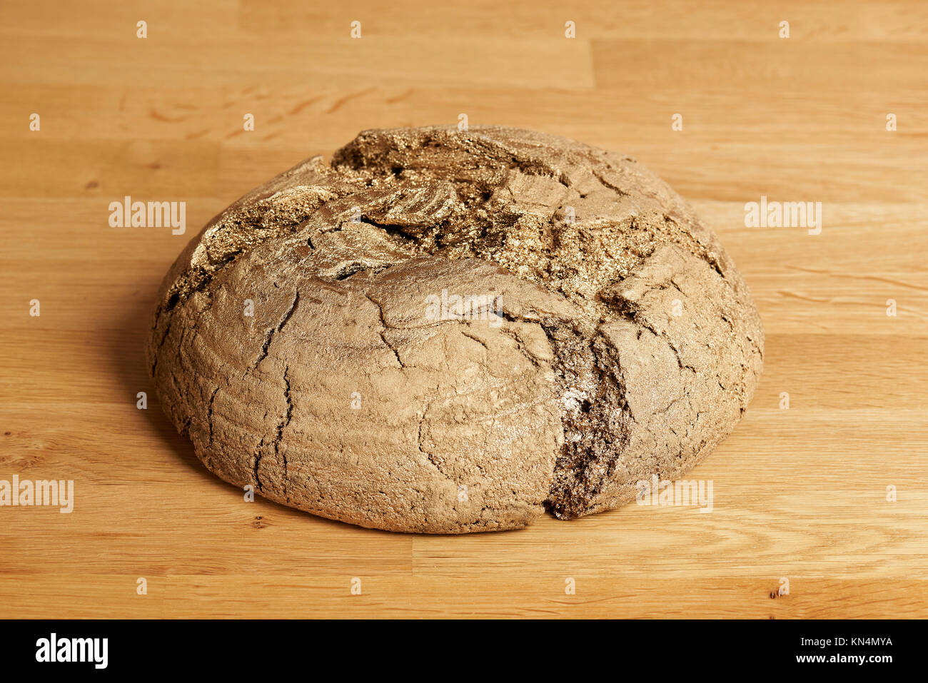 Close-up of gold metal bread. Gold food theme Stock Photo - Alamy