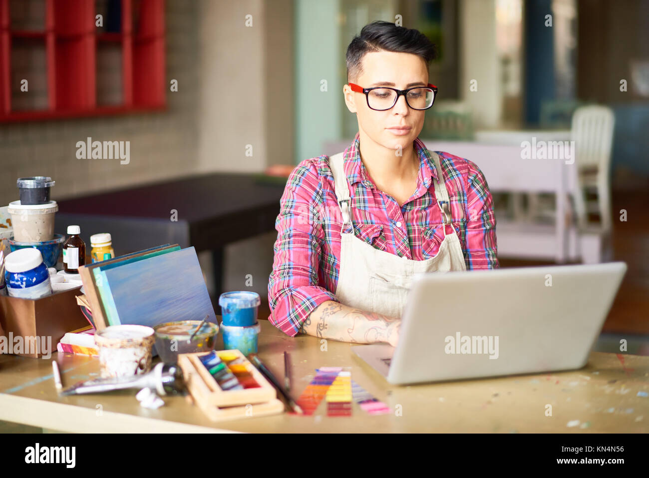 Modern Female Artist using Laptop Stock Photo - Alamy