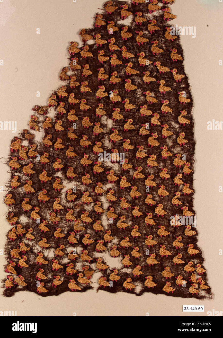 This embroidered fragment showcases fine textile work from an ancient ...