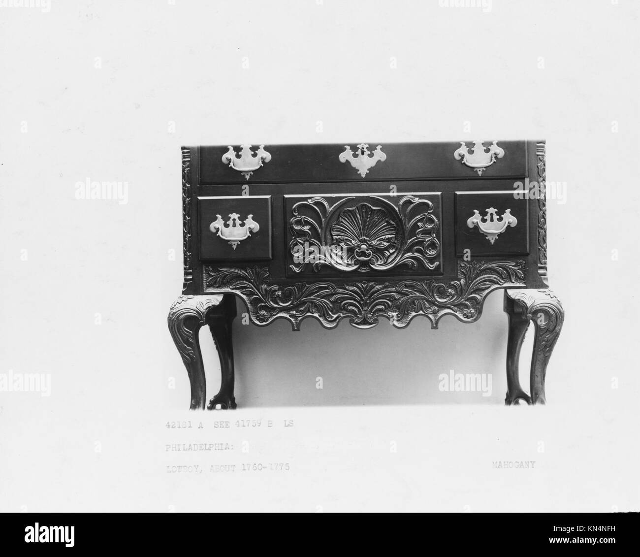This dressing table features elegant detailing and represents a refined ...