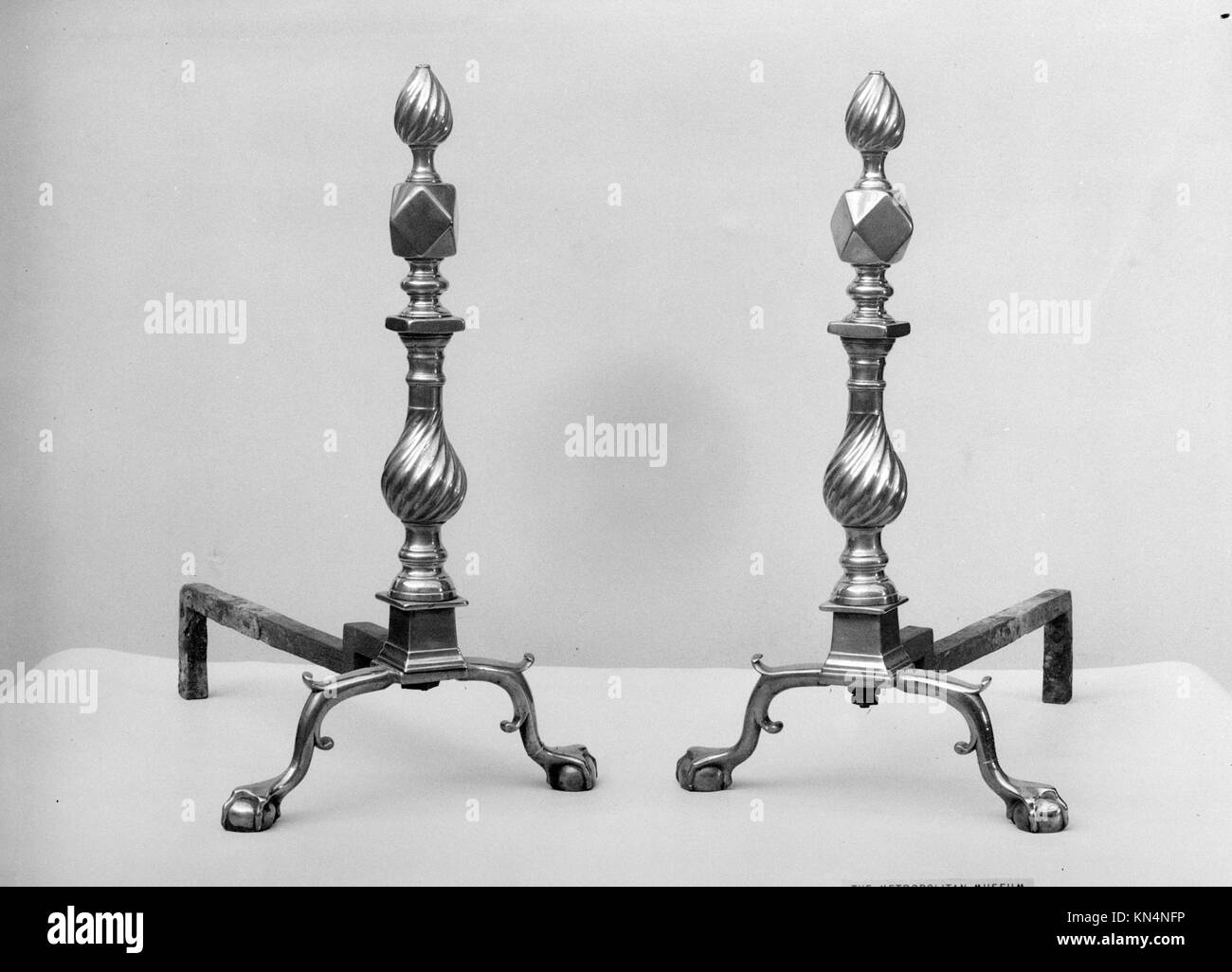 This andiron, dating from 1760-1780, is a brass and iron piece used for ...