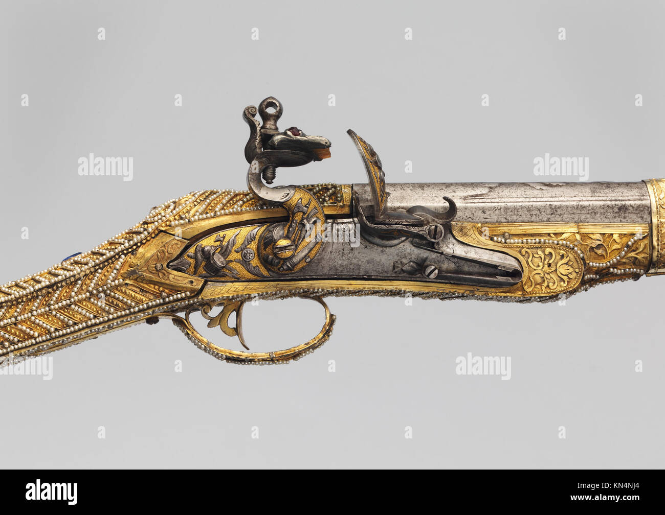 This flintlock gun is an example of early firearm technology, used ...