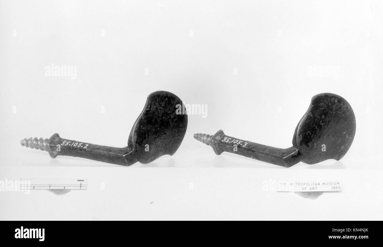 This gun hook, designed for attaching a firearm to a structure, is an ...