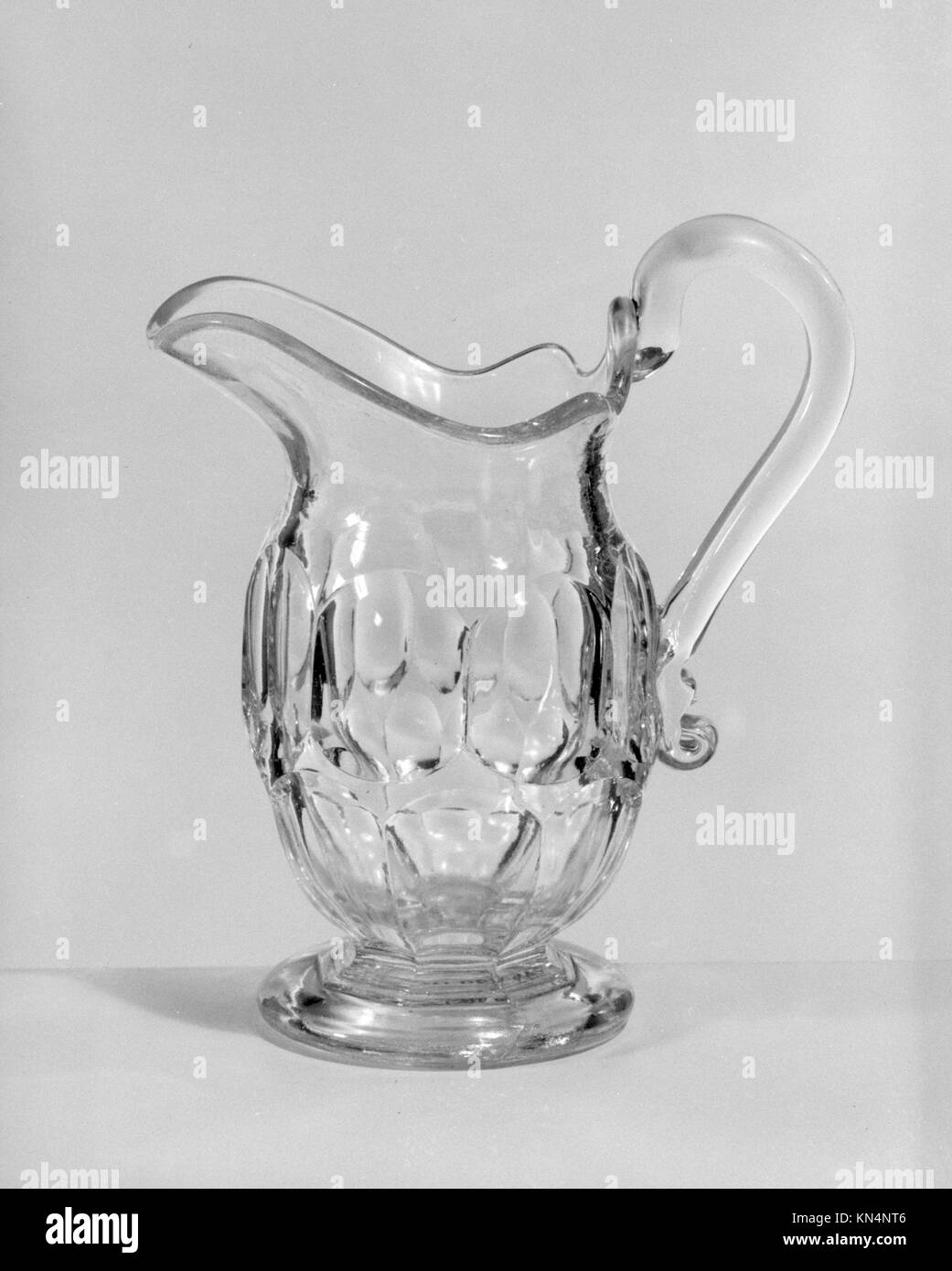 This American creamer, MET 174211 2616, is a pressed glass vessel from ...