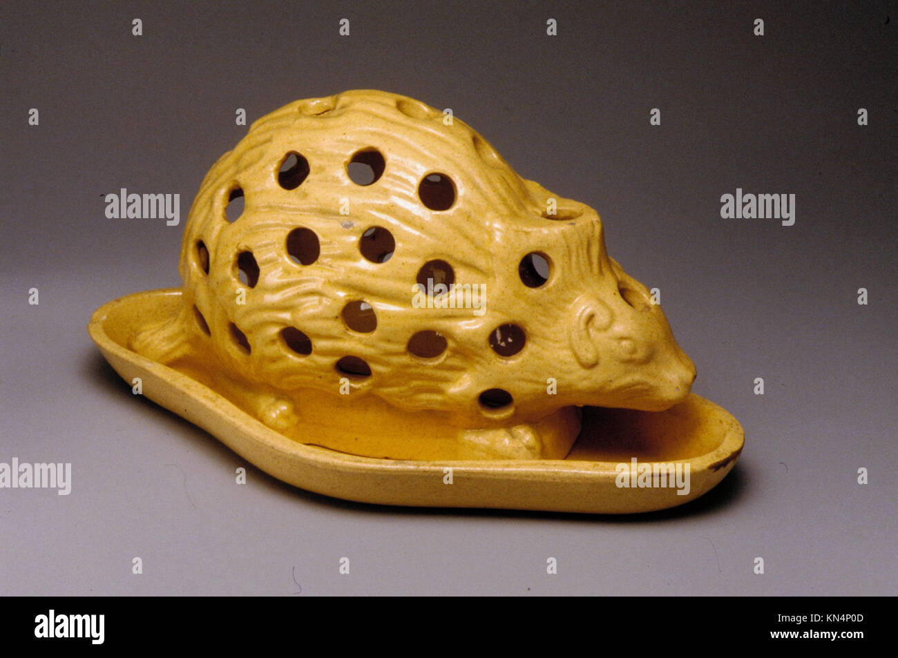 This crocus pot, made from terracotta, is designed to hold crocus ...