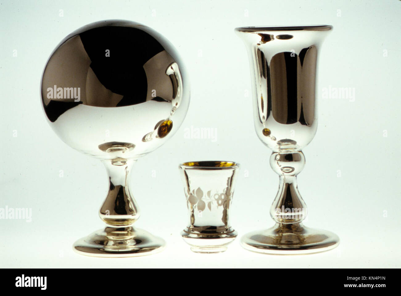 A functional and decorative hat stand made from wood or metal, designed ...