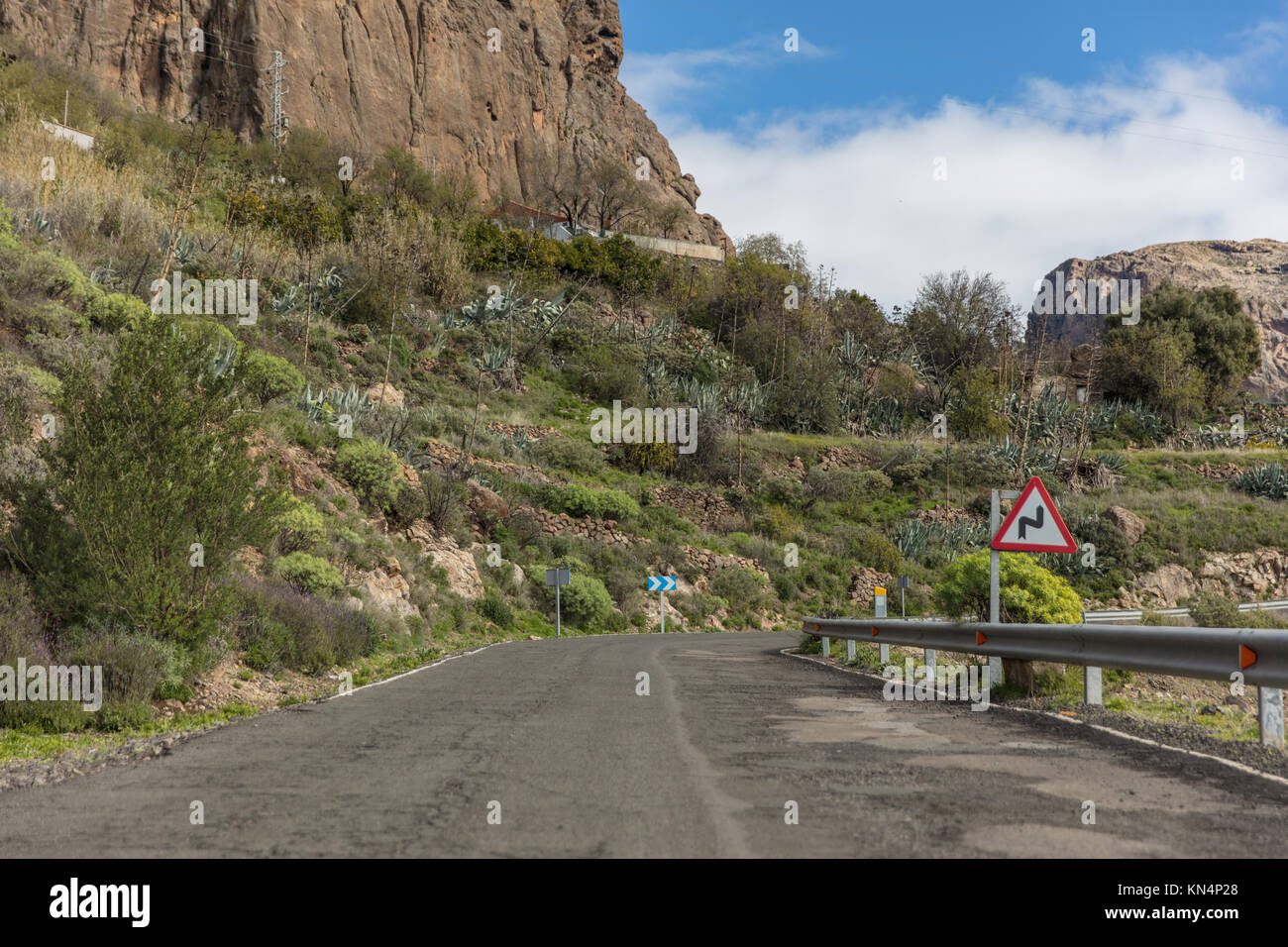 street-with-double-curve-road-sign-in-gran-canaria-stock-photo-alamy