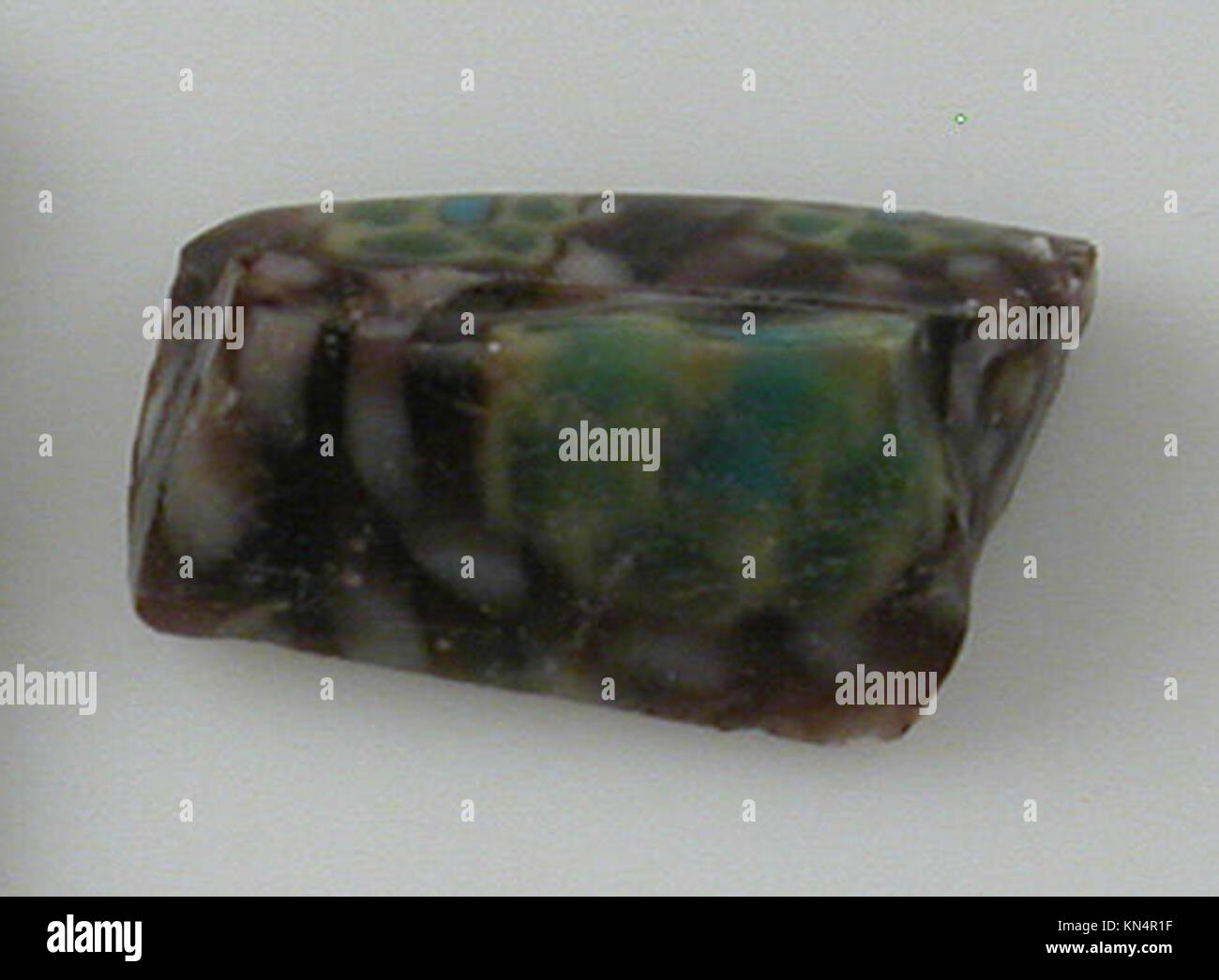 These glass fragments come from an ancient vessel, providing insight ...