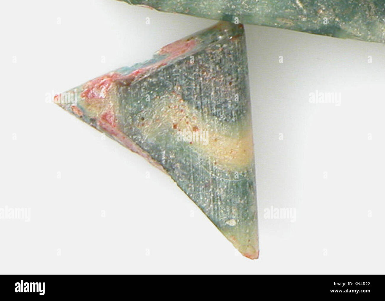 These glass fragments are remnants of an ancient vessel, showcasing the ...