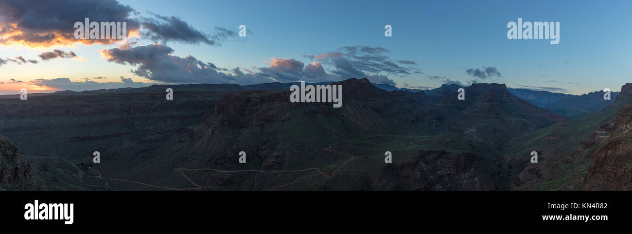 Gran Canaria panorama sunset landscape with mountains and clouds in sky ...