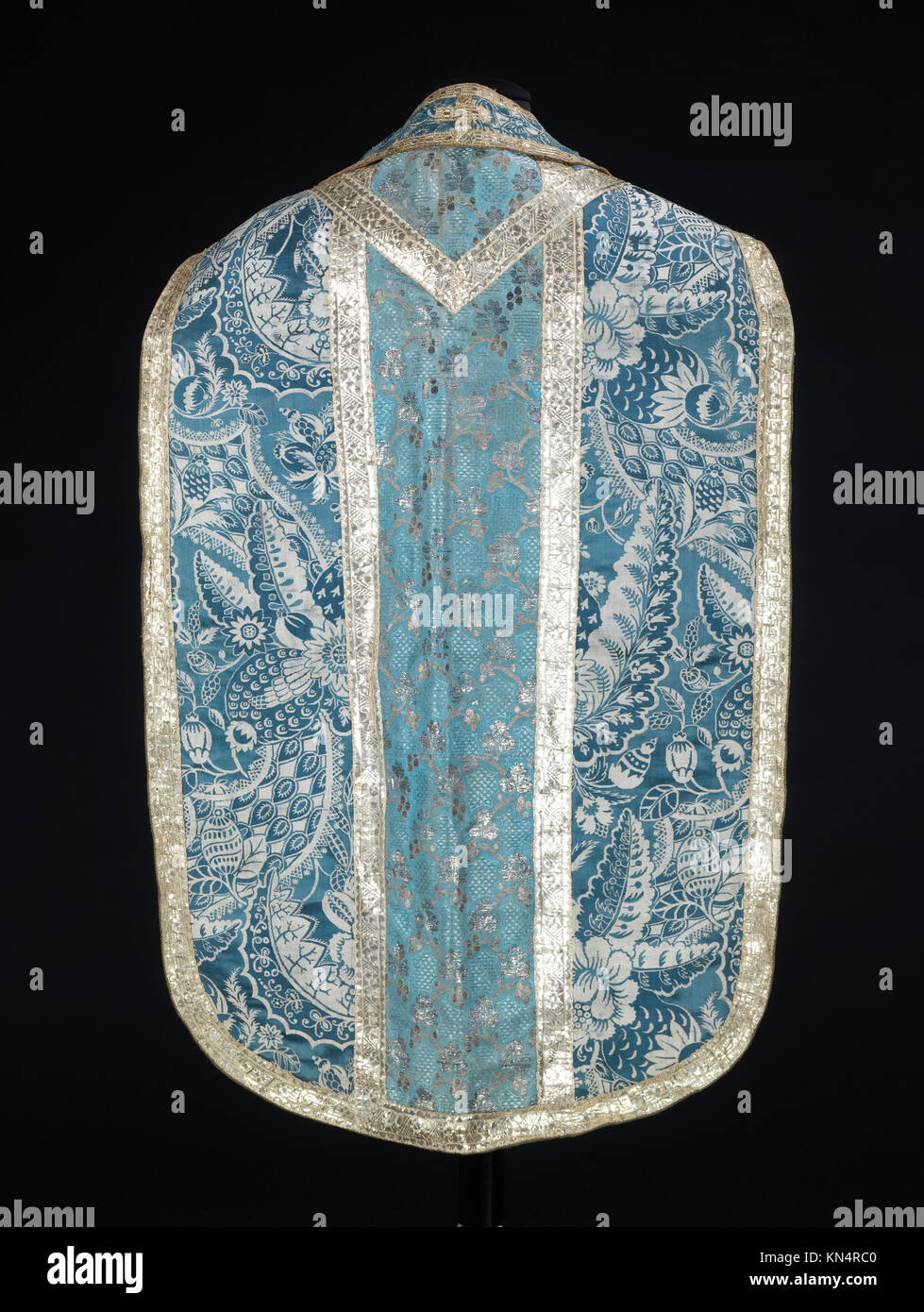 This chasuble, stole, and maniple set is a liturgical vestment, crafted ...