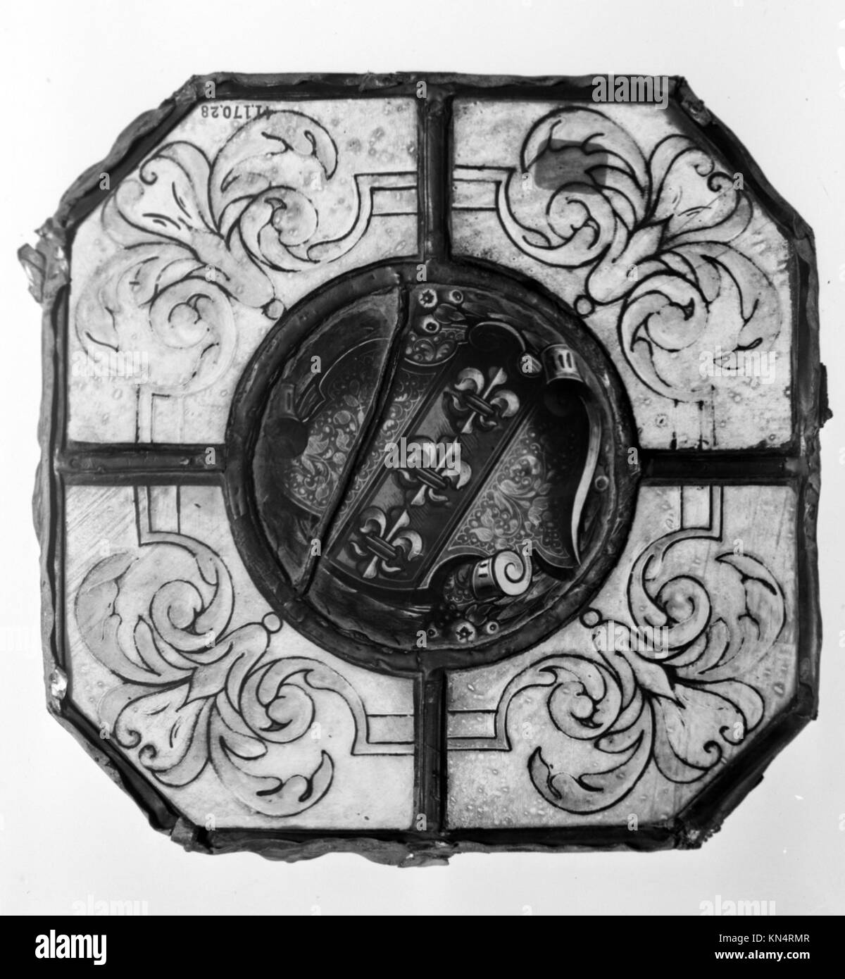 This armorial panel displays heraldic symbols, representing a familyâ ...
