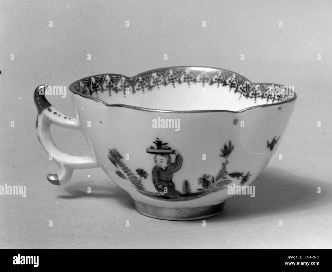 A ceramic cup from a matching set, demonstrating historical tableware ...