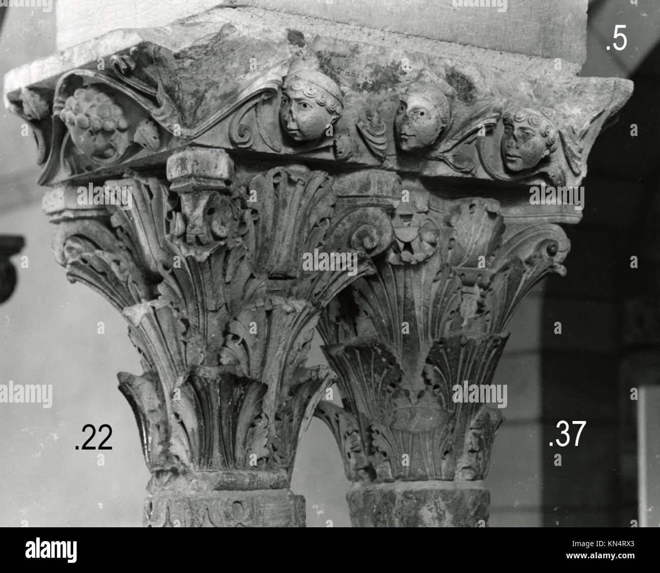 This capital, part of a column or support structure, displays intricate ...