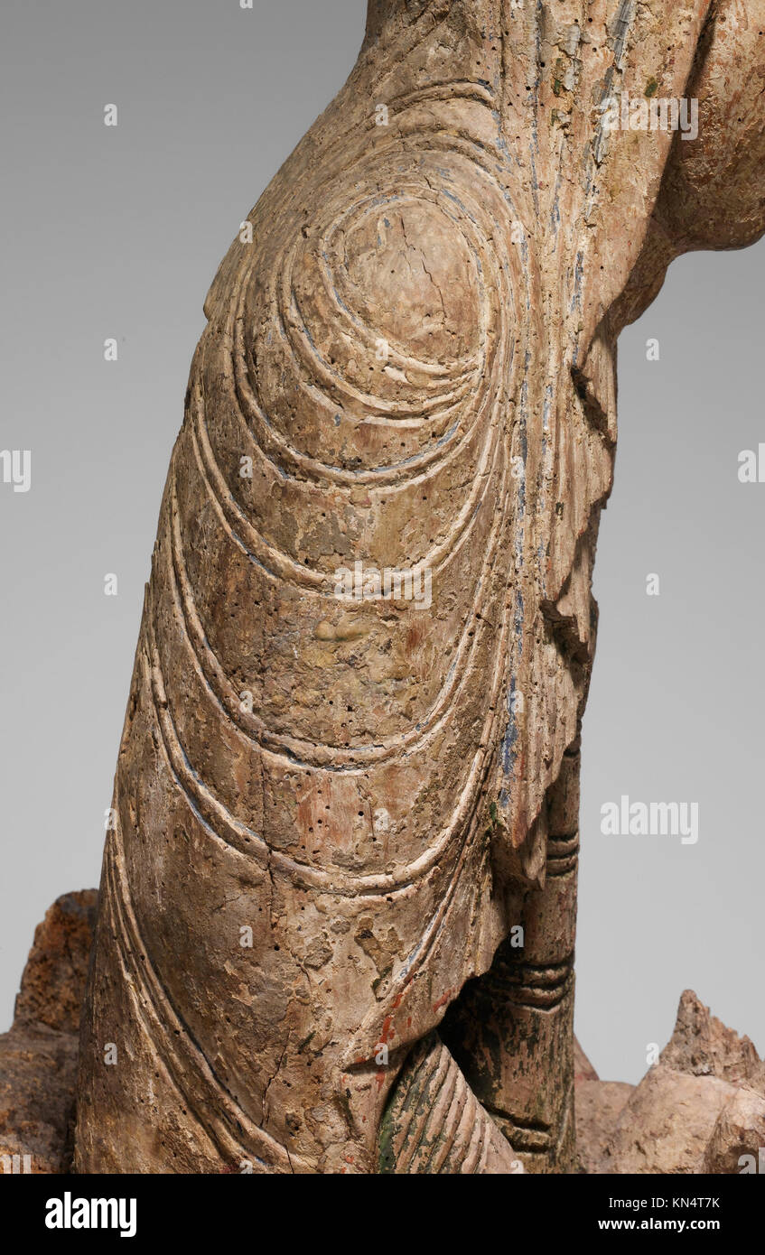 This artwork depicts the Virgin Mary enthroned with the Christ Child, a ...