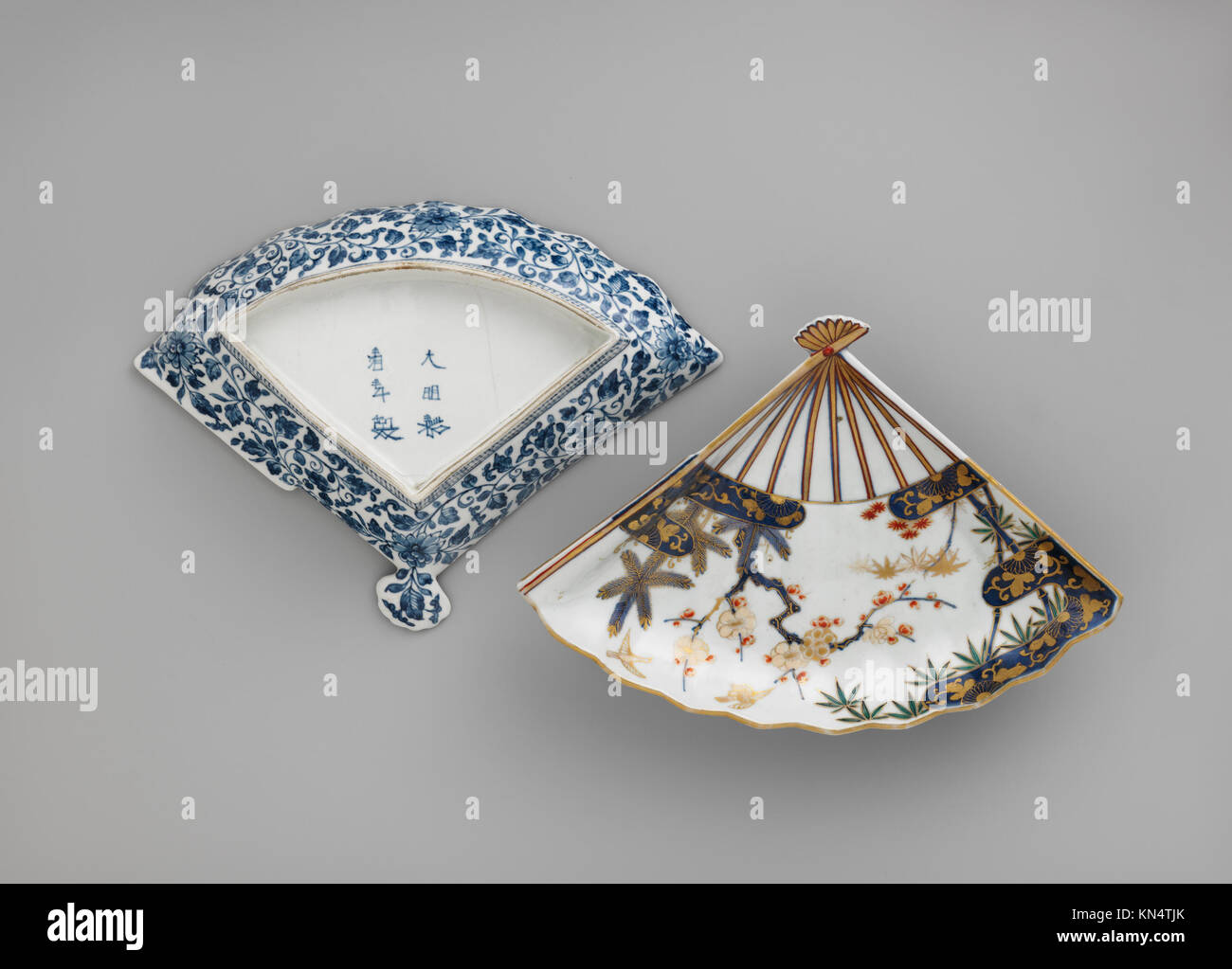 This fan-shaped dish, likely from the 18th century, features a delicate ...