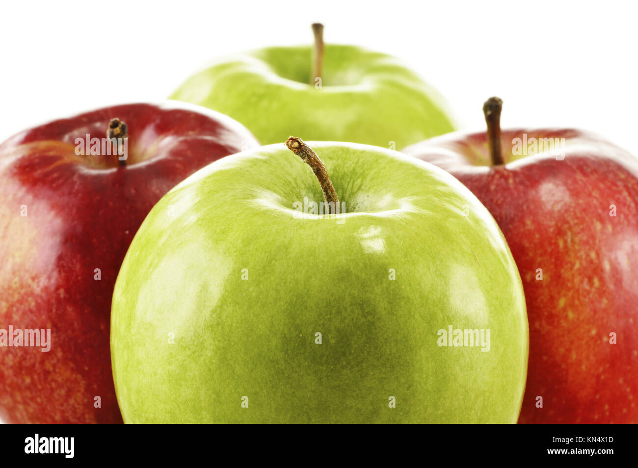 Composition with four apples over white background Stock Photo - Alamy
