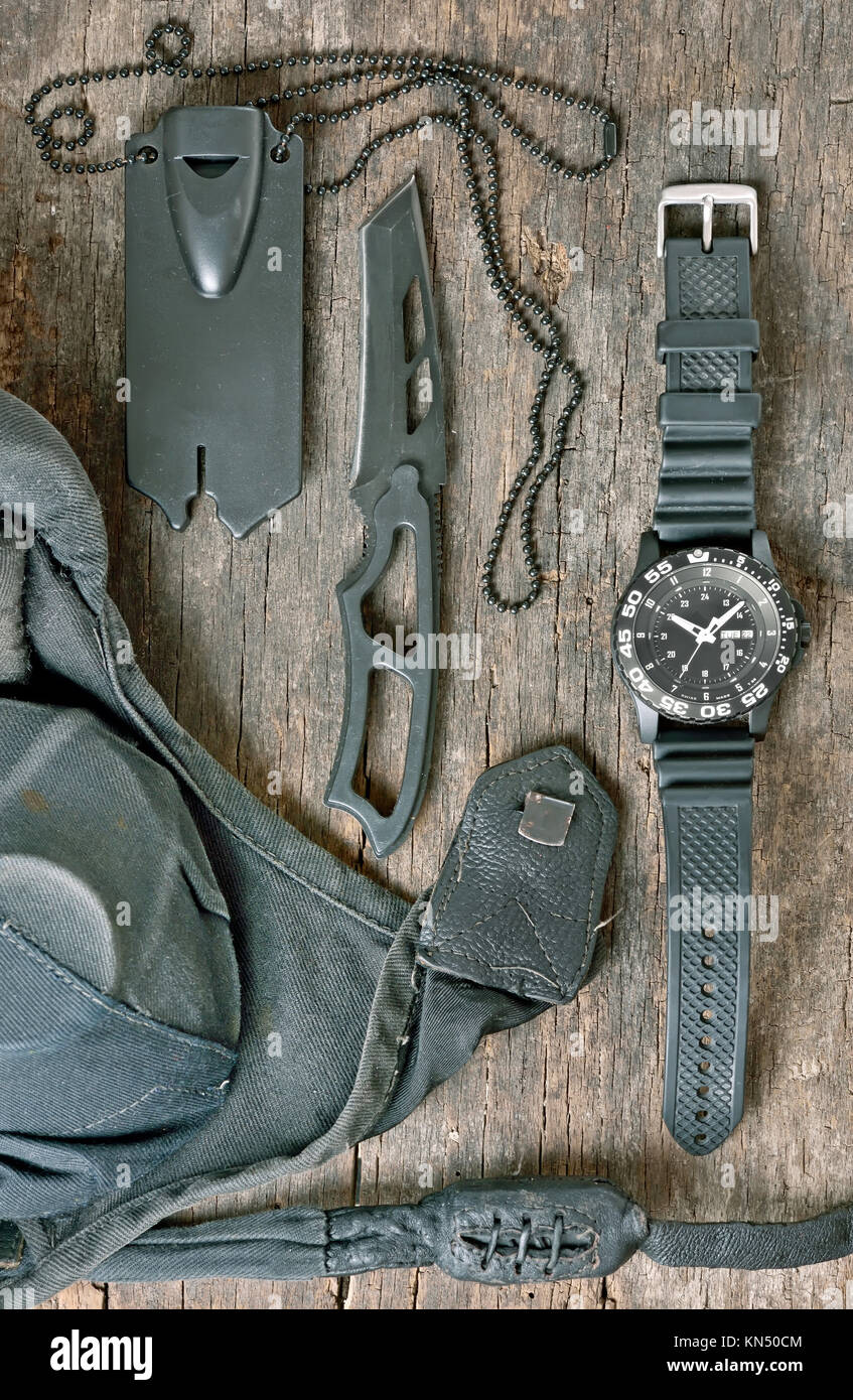 military equipment -tank driver hat on old wood Stock Photo - Alamy