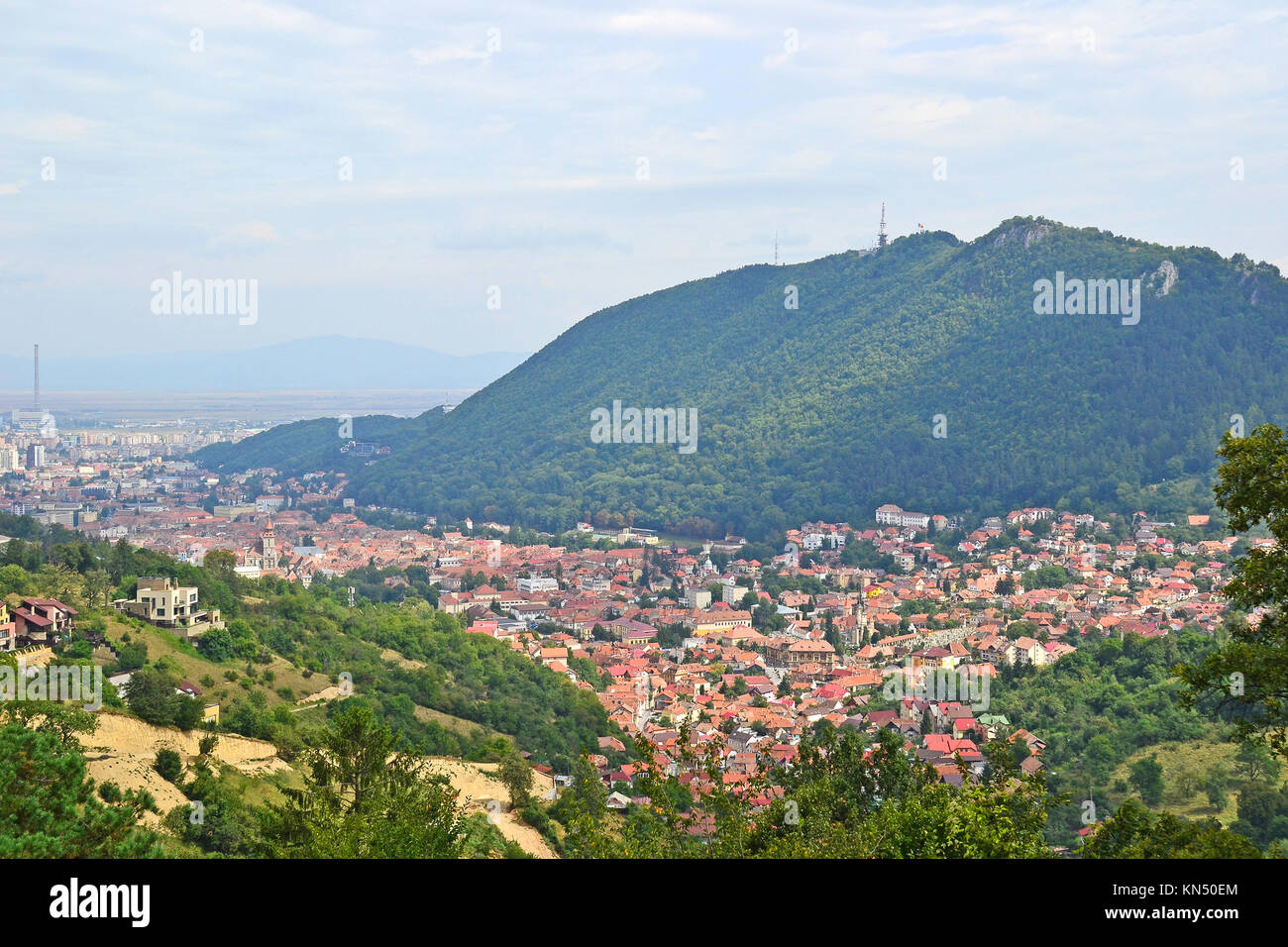 View of Brasov city in the valley, Romania Stock Photo - Alamy