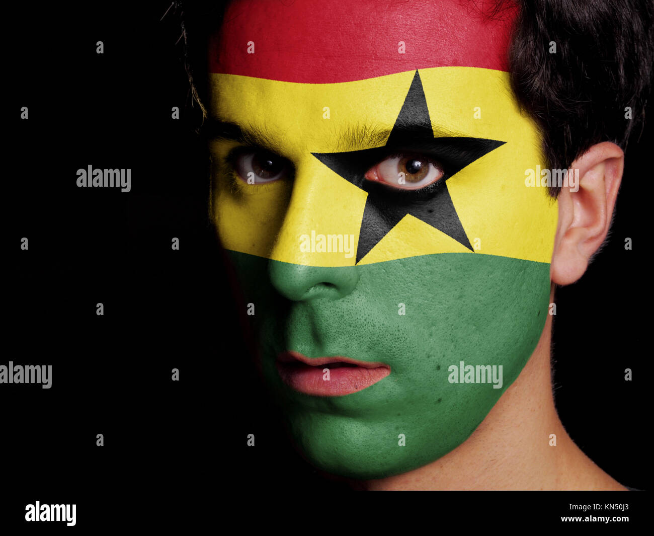 Ghana flag face paint hi-res stock photography and images - Alamy