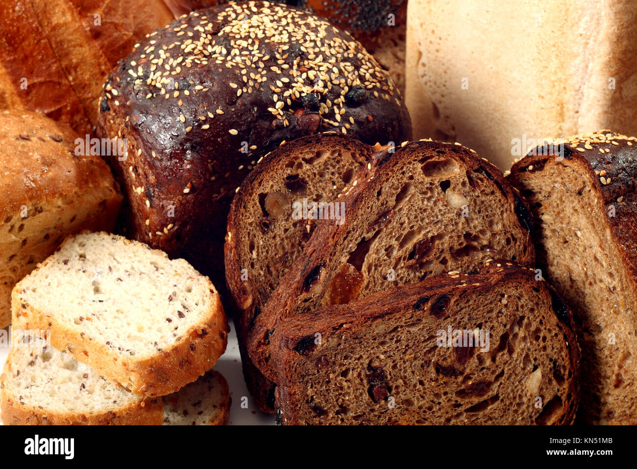 A lot of different bread on a white background Stock Photo - Alamy