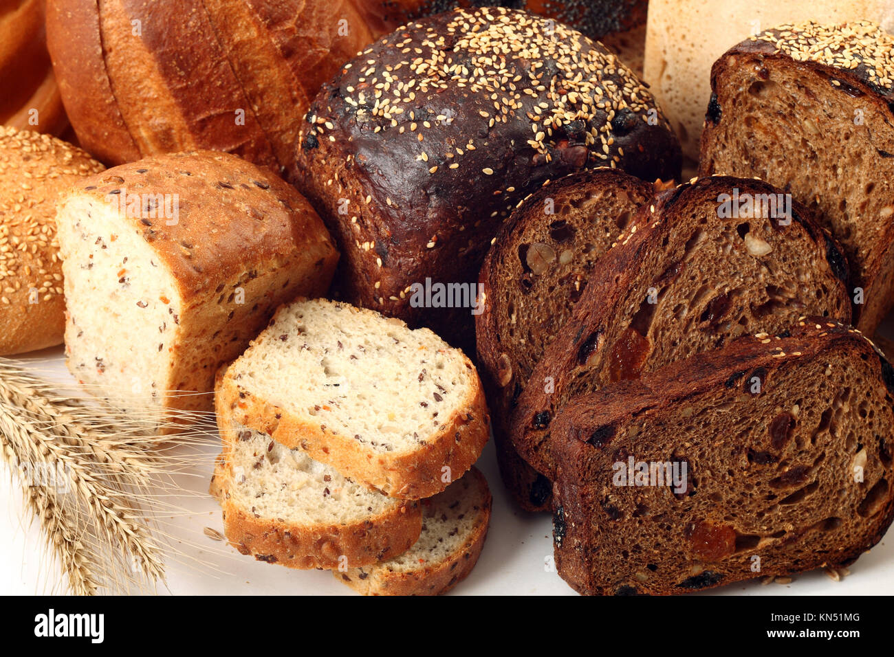 A lot of different bread on a white background Stock Photo - Alamy