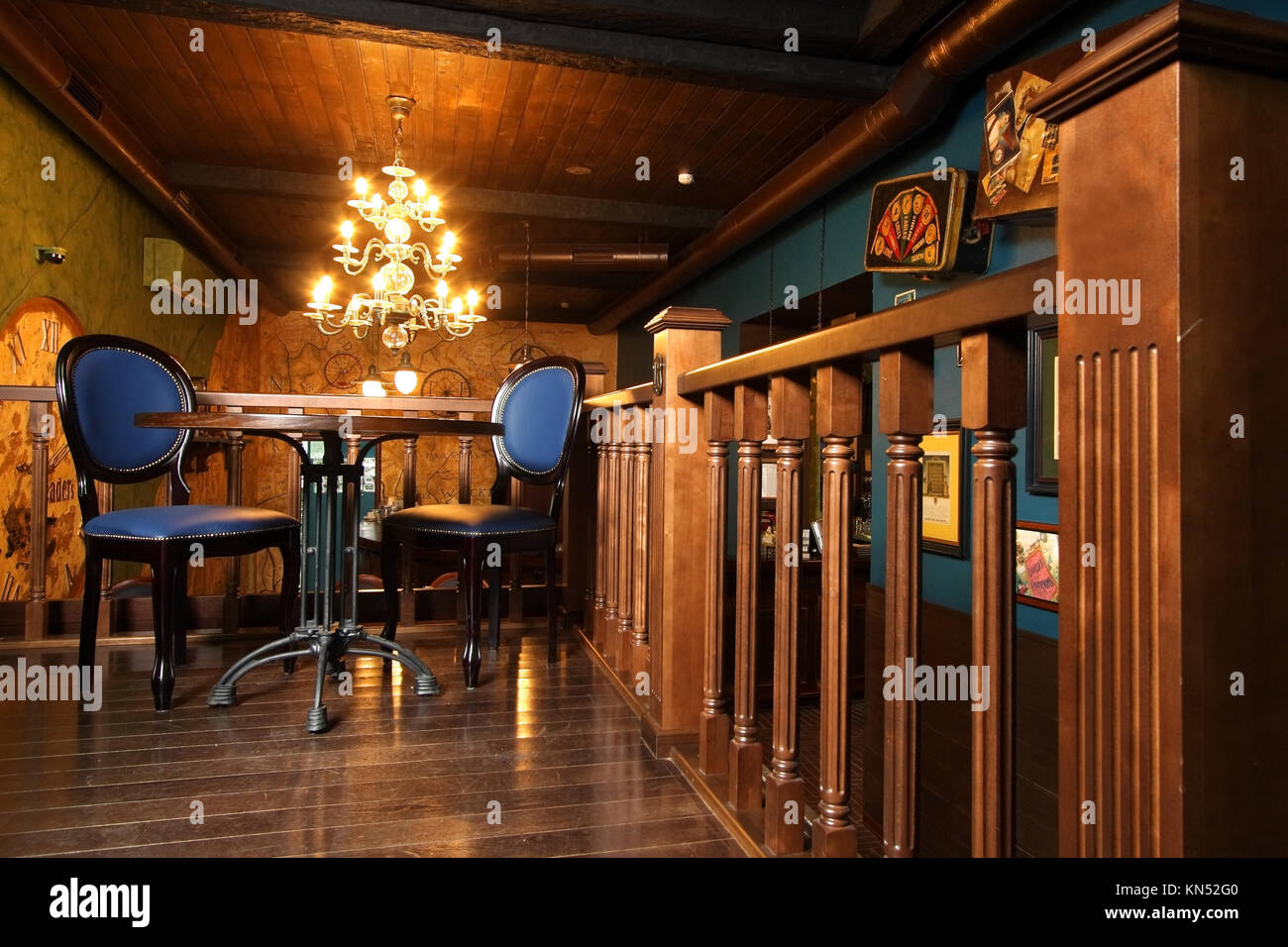 Cosy little table at comfortable restaurant Stock Photo - Alamy